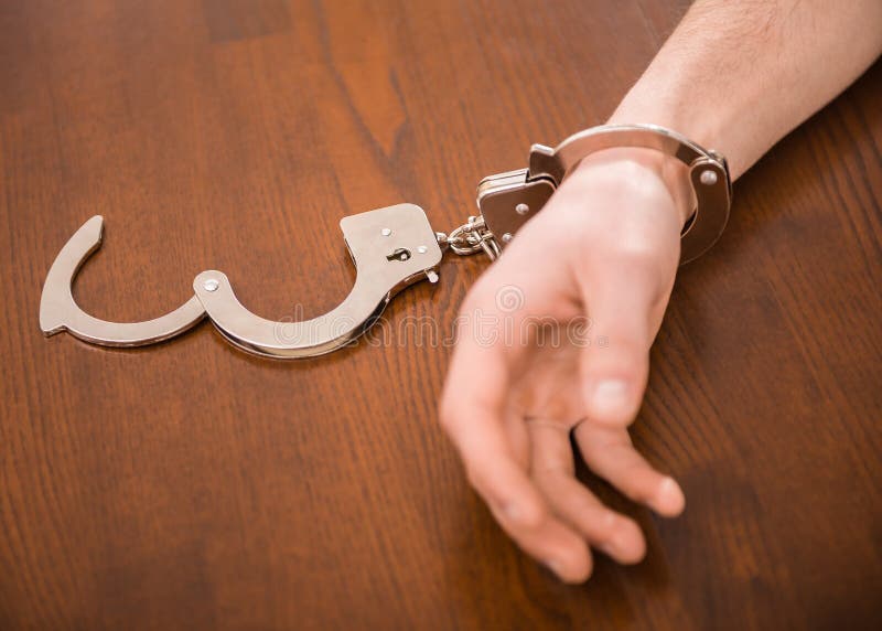 Hands with handcuffs. stock photo. Image of freedom, people - 53387638