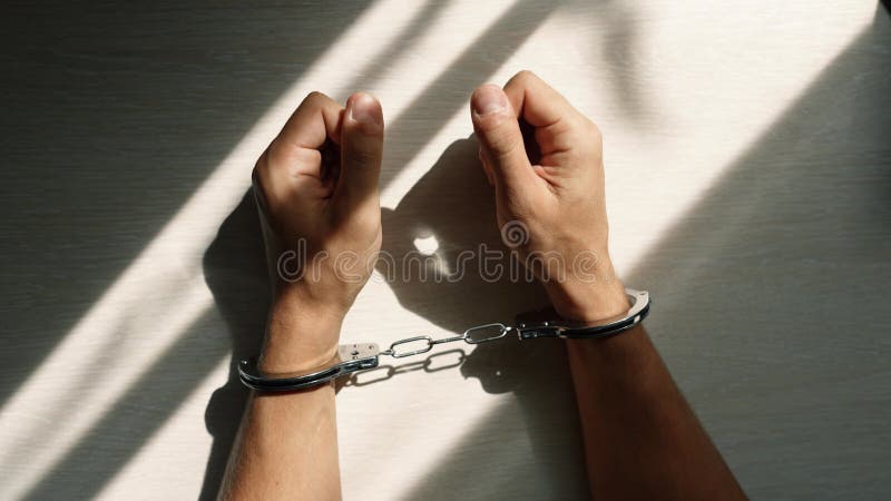 Hands in Handcuffs on the Table Stock Video - Video of rights ...