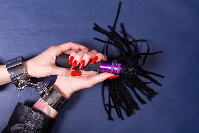 Hands in Handcuffs with Whip, BDSM Theme Stock Photo - Image of cuff ...