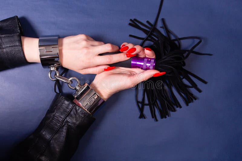 Hands in Handcuffs with Whip, BDSM Theme Stock Photo - Image of hands ...