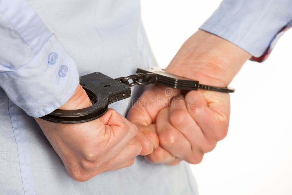 Hands in handcuffs stock photo. Image of inmate, defense - 34131308