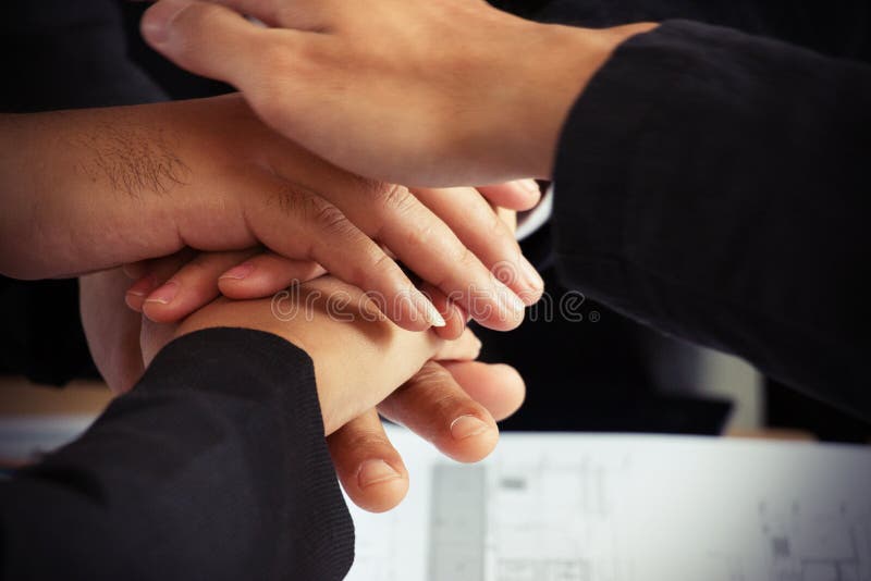 Hands on Hands Teamwork and Partnership Sign Stock Image - Image of ...