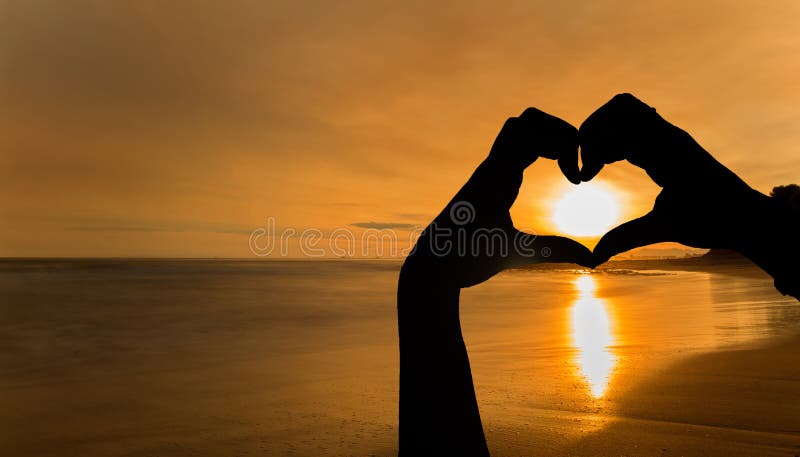 Hands with a Heart Shape at Sunset on a Beach Stock Photo - Image of ...