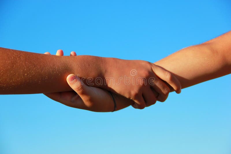 Hands held firmly stock image. Image of friends, friendly - 26414061