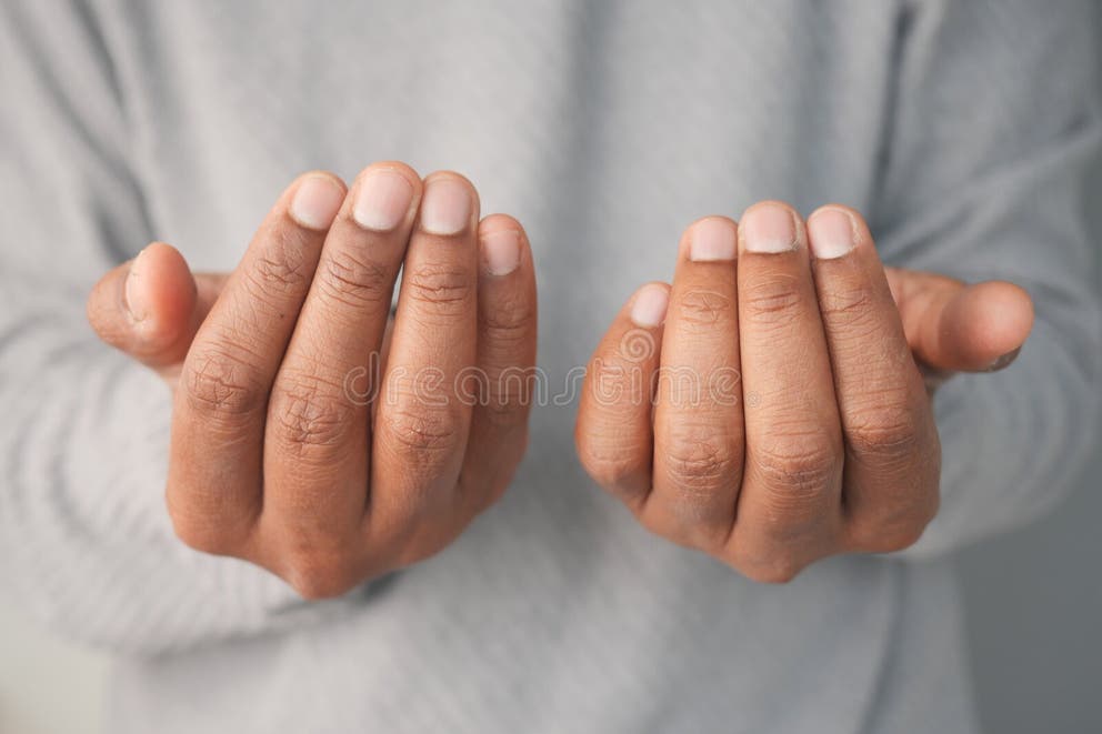 Hands Held Open in a Gesture of Offering or Invitation Stock Photo ...