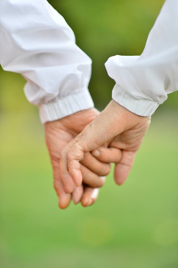 Hands held together stock photo. Image of mature, care - 36708588