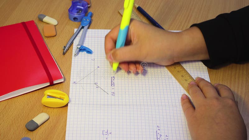 High School Student Solving Math Examples in a Notebook. Stock Video ...