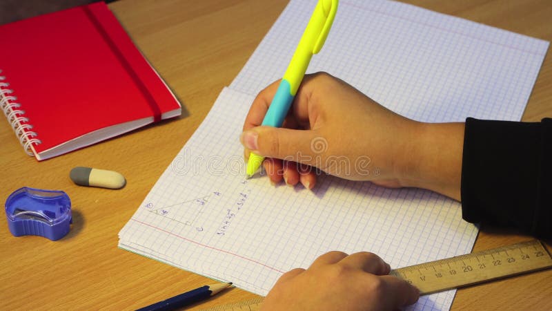 High School Student Solving Math Examples in a Notebook. Stock Video ...