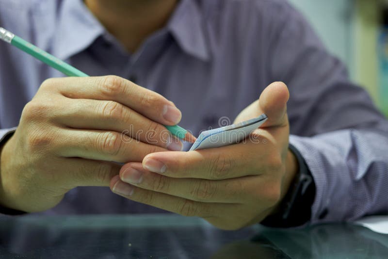 Hands Hold Pencil and Writing on Stick it Paper in Work Uniform Stock ...