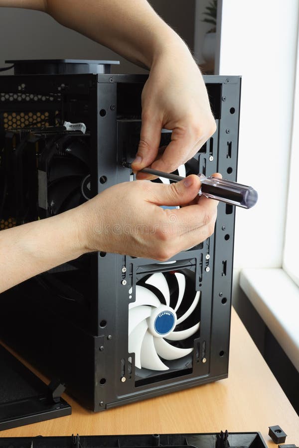 Hands Hold Screwdriver and from Fan of Computer Cooling System Stock Photo - Image of technician ...