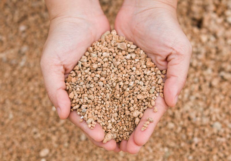 The hands hold small rocks stock image. Image of hold - 32080399