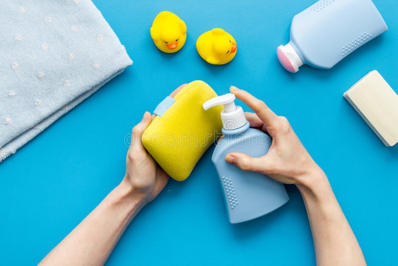Hands Holding Baby Care Products, View from Above Stock Image - Image ...