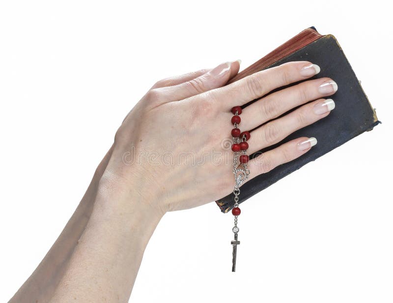 Hands Holding the Bible and Praying with a Rosary Stock Image - Image ...