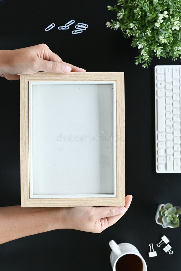 Hands Holding Blank Picture Frame Top View Office Desk with Work ...
