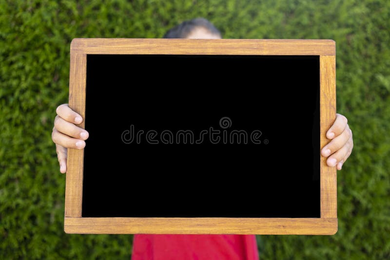 Hands holding blank slate stock photo. Image of space - 258785384