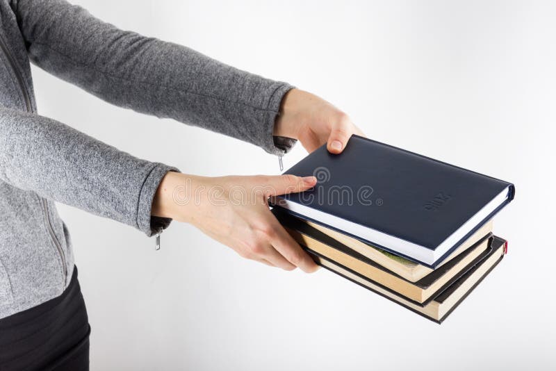 Hands Holding Books on White Background, Education Background Stock ...