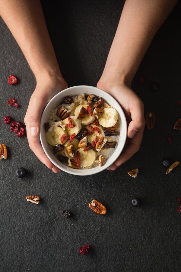 Hands Holding a Bowl of Fruit Cereal Stock Photo - Image of morning ...