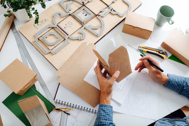 Hands Holding a Box in Hands, Thinking Process on Ways To Improve it ...