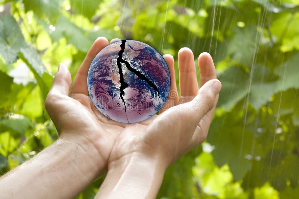 Hands holding broken earth stock photo. Image of leafy - 11918960