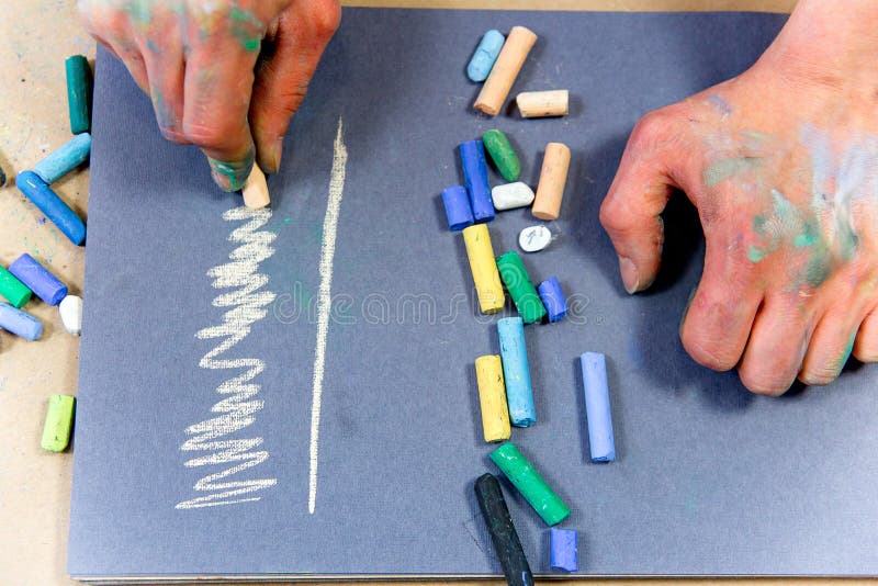Hands Holding Chalks and Drawing on a Blackboard Stock Image - Image of ...