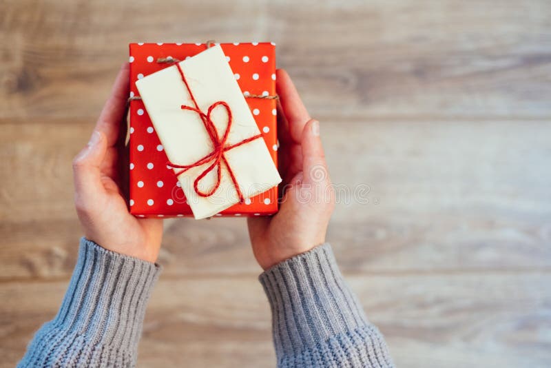 Hands Holding Christmas Present Gift Stock Image - Image of hand ...