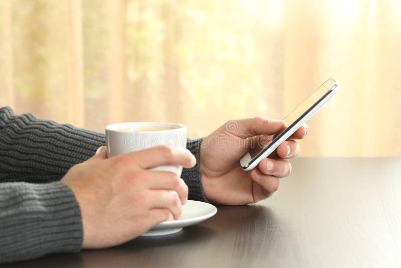 Hands Holding Coffee and Using Smart Phone Stock Image - Image of ...