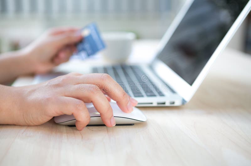 Hands Holding a Credit Card and Using Laptop Computer Stock Photo ...