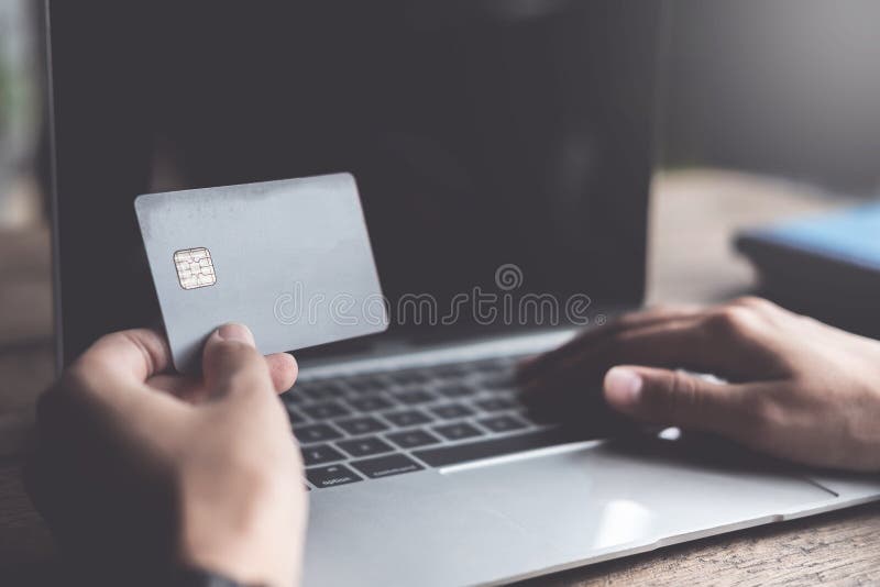 Hands Holding Credit Card and Using Laptop. Online Shopping Stock Image ...