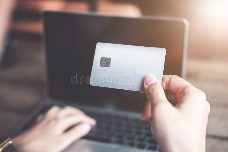 Hands Holding Credit Card and Using Laptop. Online Shopping Stock Image ...