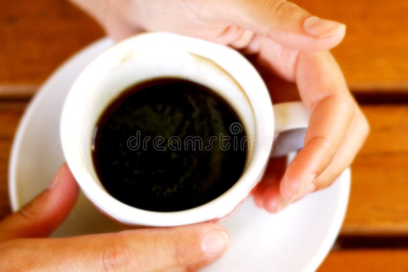 Hands Holding a Cup of Coffee Stock Photo - Image of warm, caffeine: 999816