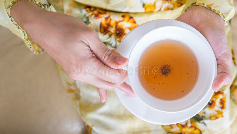 Hands Holding Cup of Tea IV Stock Photo - Image of hand, drink: 41958312