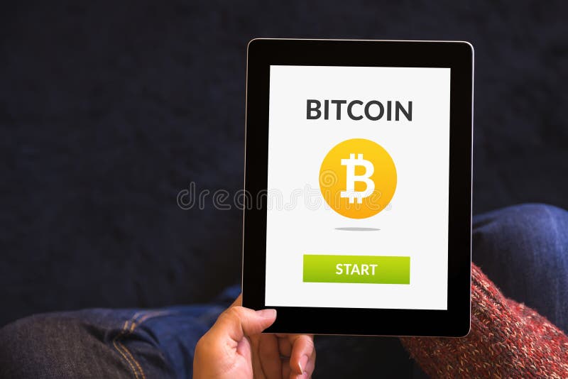Hands Holding Digital Tablet Computer with Bitcoin Concept on Sc Stock ...