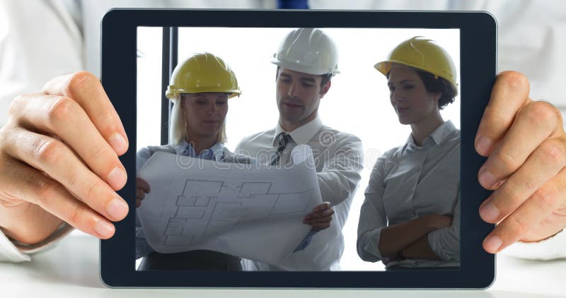 Hands Holding Digital Tablet Showing Architect Discussing Plans Over ...