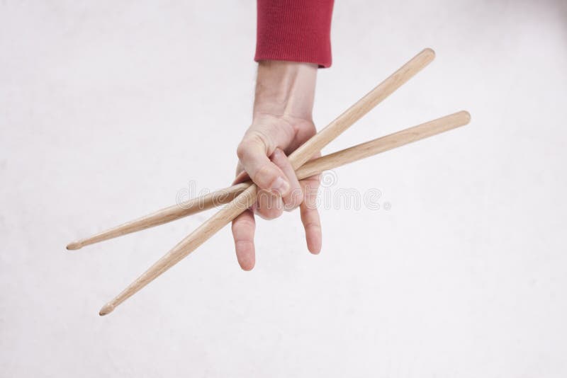 Hands holding drumsticks stock image. Image of male, background - 80073457