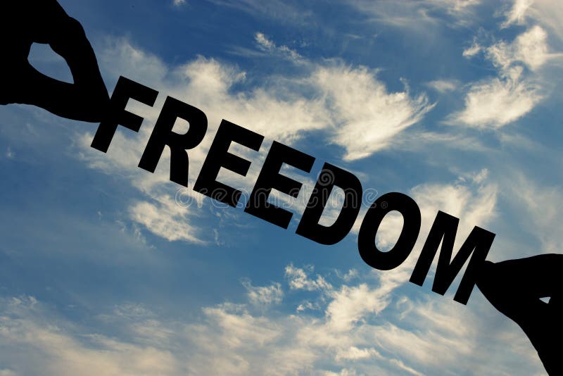 Hands holding freedom text stock photo. Image of move - 111228112
