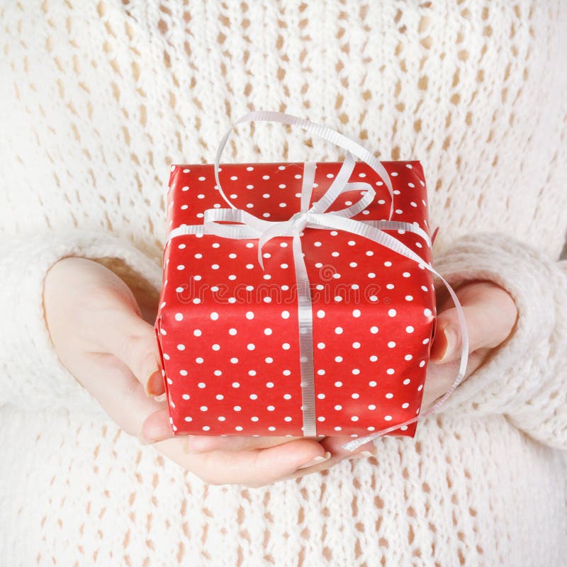 Hands holding gift box stock photo. Image of greeting - 180654024