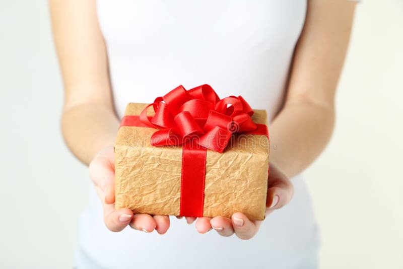 Hands holding gift box stock image. Image of brown, love - 51156035