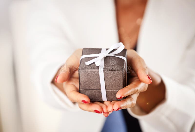 Hands holding gift box stock photo. Image of holding - 80123630