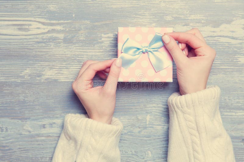 Hands holding gift stock photo. Image of event, celebration - 46348960