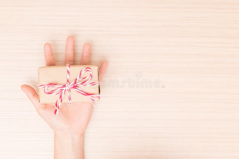 Hands holding gift stock photo. Image of little, event - 66473754