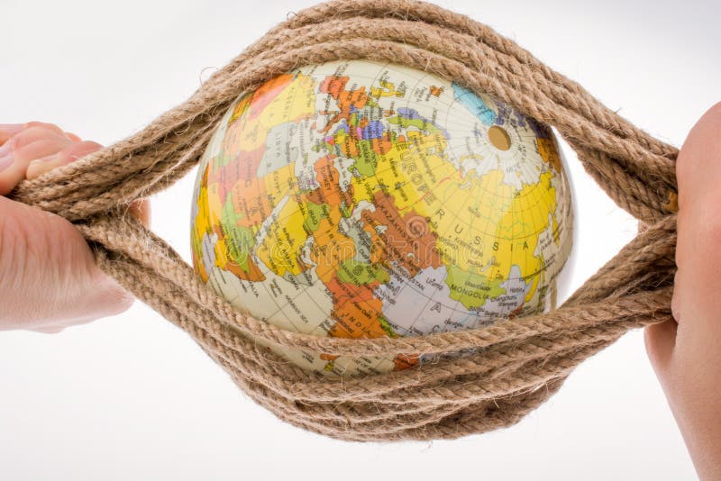 Globe in Hand Wrapped with Rope Stock Image - Image of world, hand ...