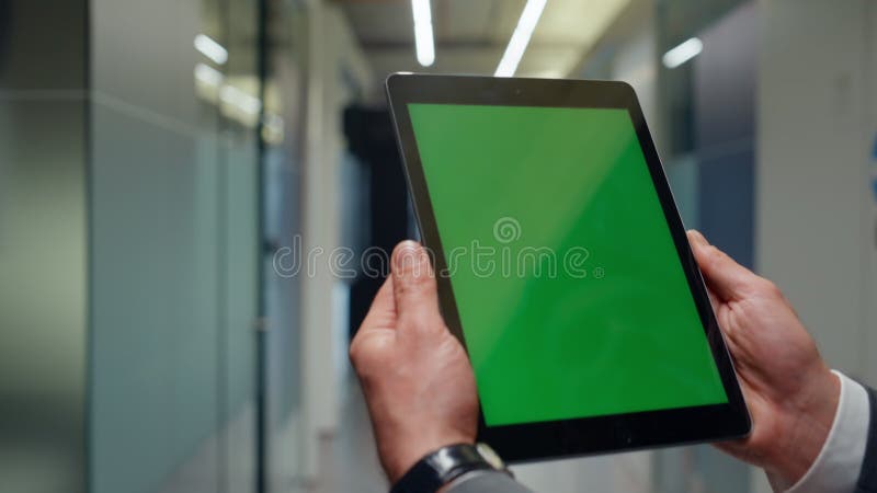 Hands Holding Greenscreen Tablet Reading Work Tasks on Go Closeup. Man ...