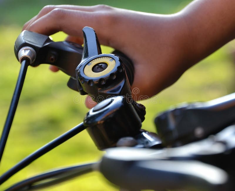 Hands Holding the Handlebars on the Bike Stock Photo - Image of ...