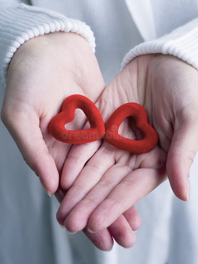 Hands holding hearts stock image. Image of anniversary - 50178505