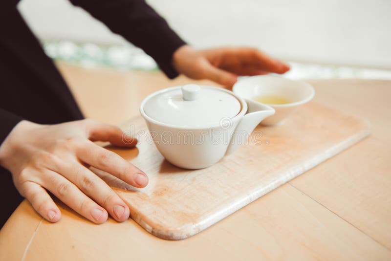 Hands Holding Japanese Sencha Tea in Clay Pot. Stock Photo - Image of ...