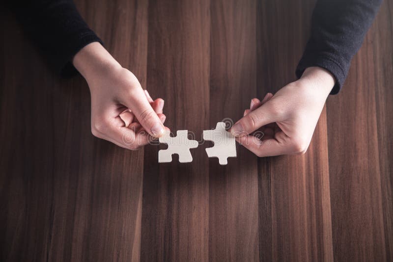Hands Holding Jigsaw Puzzle Piece. Business Solution, Success Stock ... Hands Holding Jigsaw Puzzle Piece. Business Solution, Success Stock ...