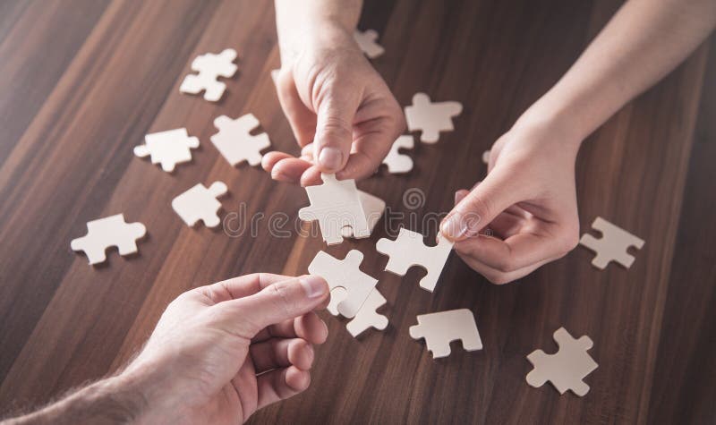 Hands Holding Jigsaw Puzzle Piece. Solution, Success, Teamwork Stock ... Hands Holding Jigsaw Puzzle Piece. Solution, Success, Teamwork Stock ...