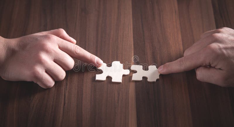 Hands Holding Jigsaw Puzzle Piece. Solution, Success, Teamwork Stock ... Hands Holding Jigsaw Puzzle Piece. Solution, Success, Teamwork Stock ...