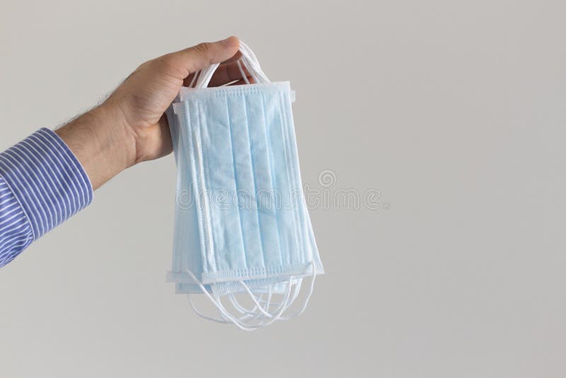 Hands Holding a Medical Masks , Coronavirus Stock Image - Image of ...