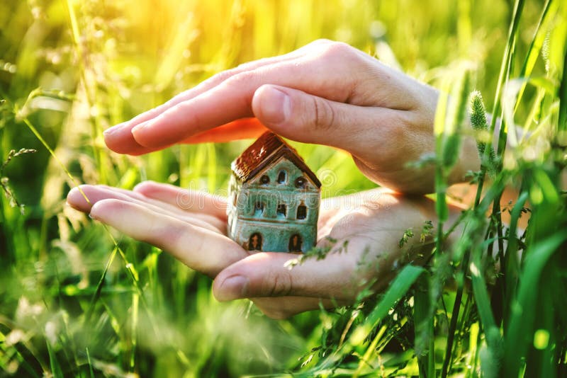 Hands Holding Model of House Stock Photo - Image of green, conceptual ...